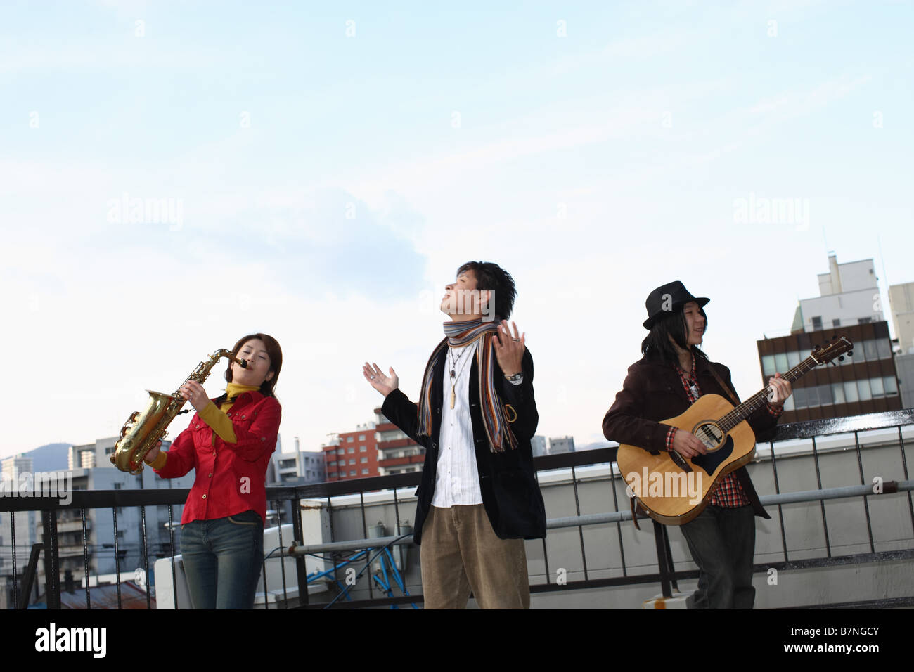 Young people playing instruments Stock Photo - Alamy