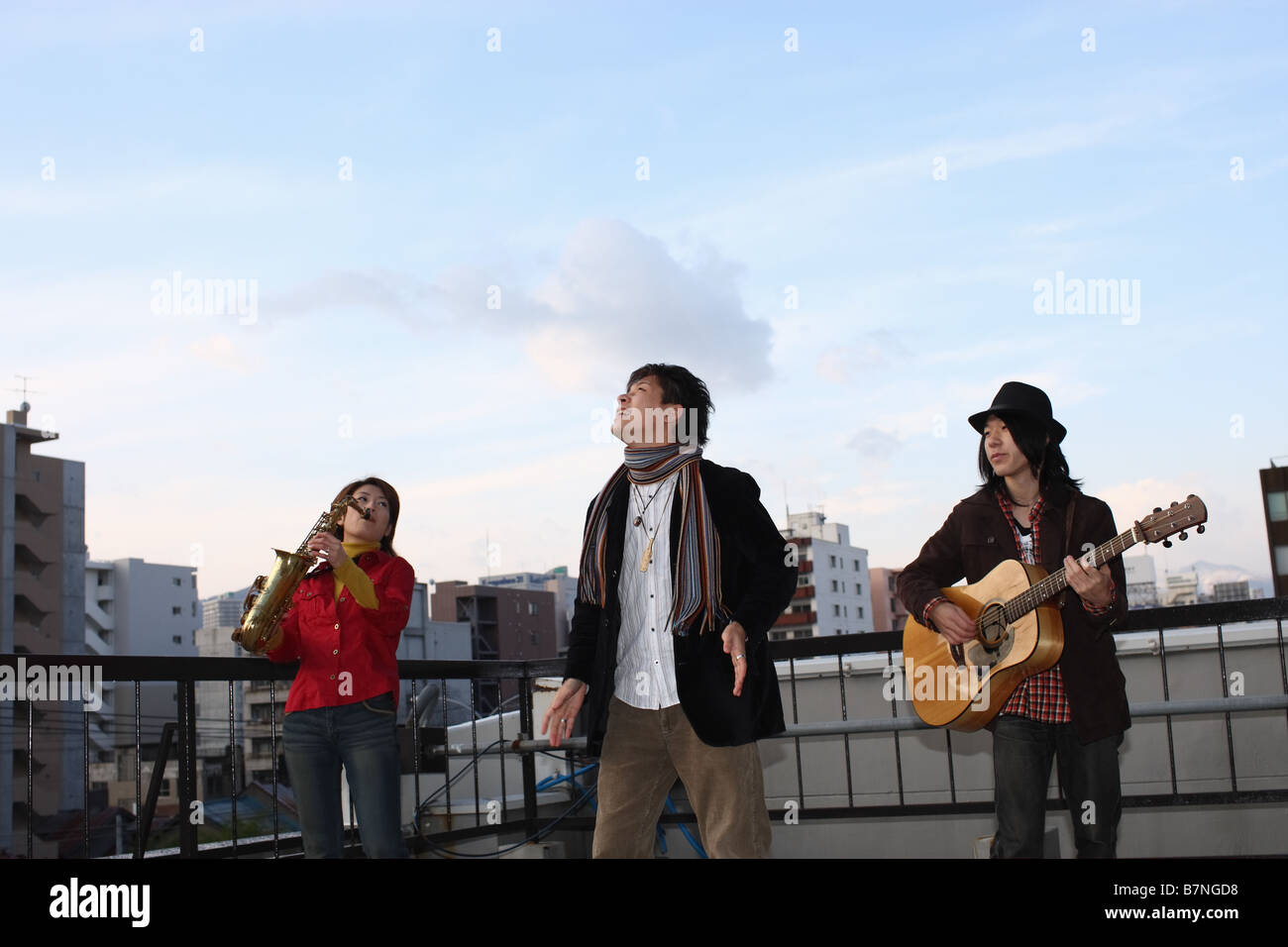 Young people playing instruments Stock Photo - Alamy