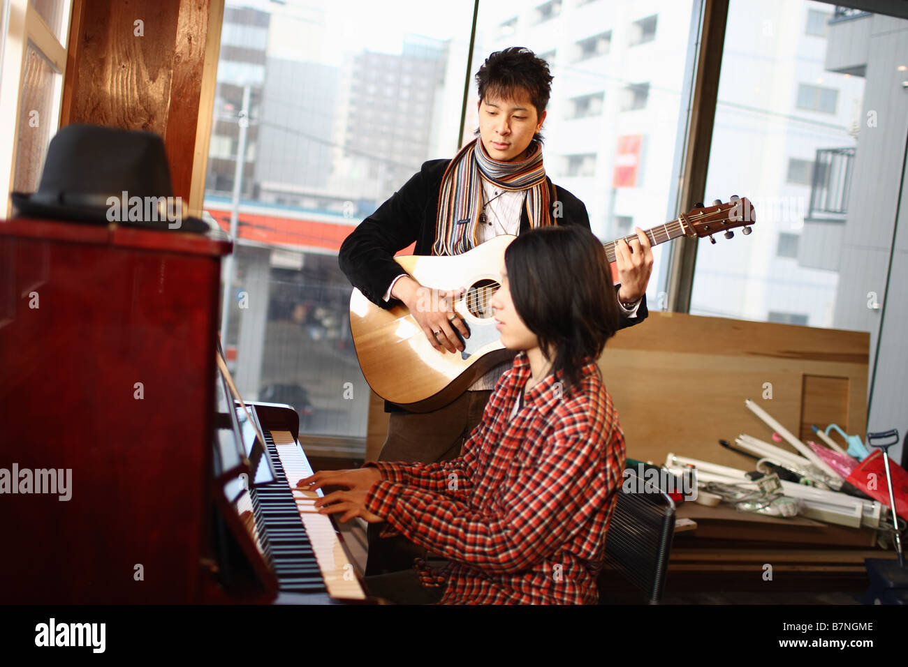 Young people playing instruments Stock Photo - Alamy