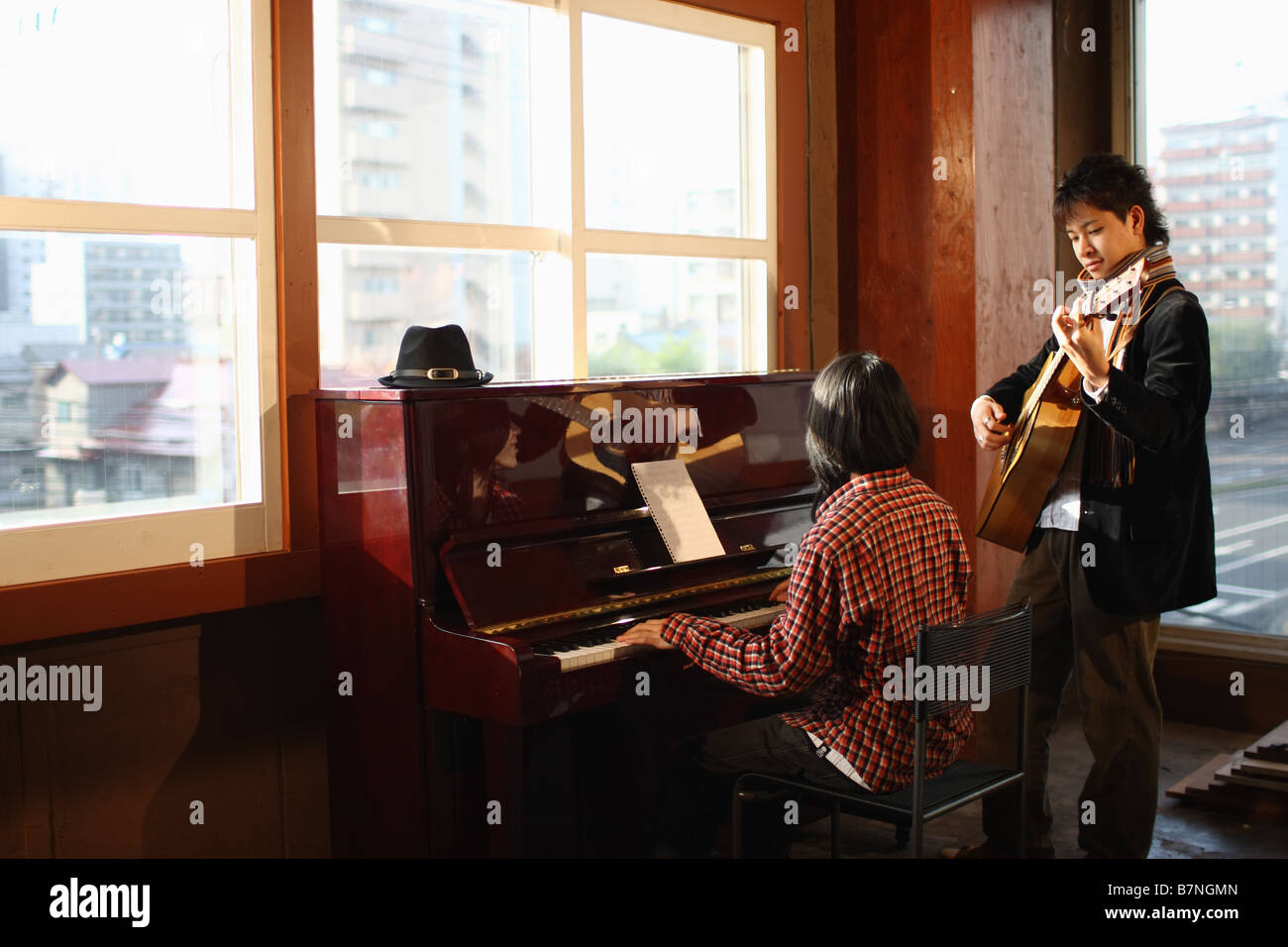 Young people playing instruments Stock Photo - Alamy