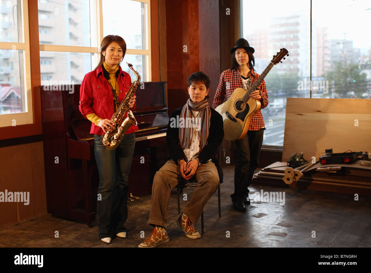 Young people playing instruments Stock Photo - Alamy