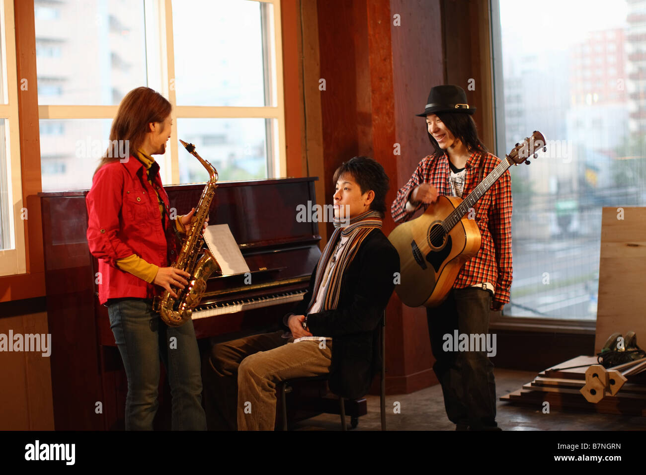 Upright piano and young woman hi-res stock photography and images - Alamy