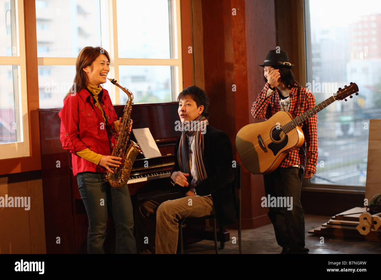 Upright piano and young woman hi-res stock photography and images - Alamy