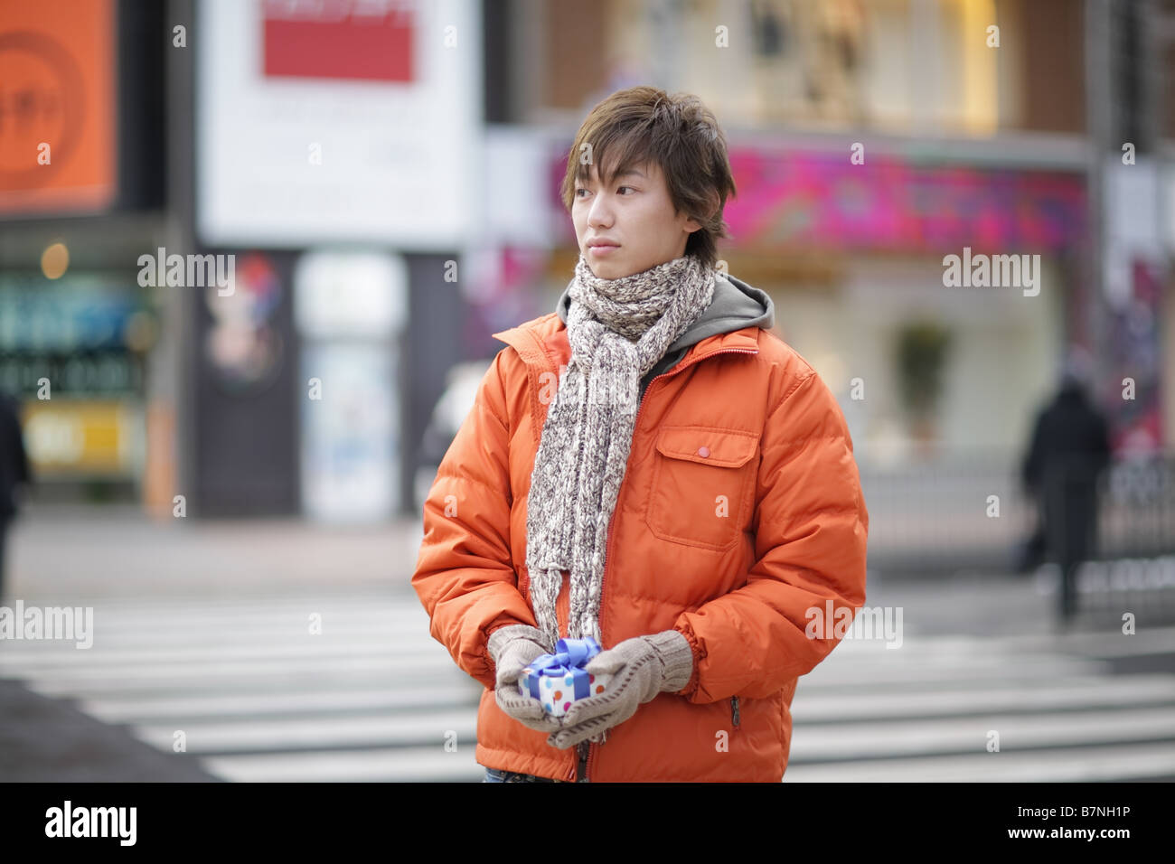 A man with a present Stock Photo - Alamy