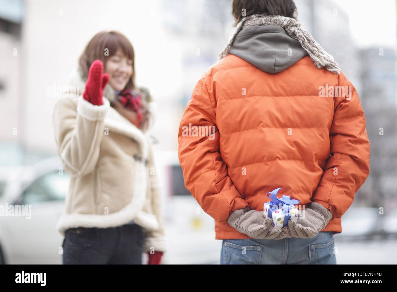 Man with a present Stock Photo - Alamy