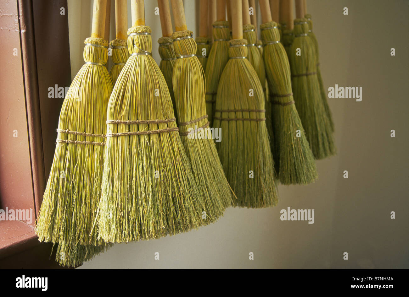 A set of traditional hand made Shaker straw brooms at the old Shaker ...