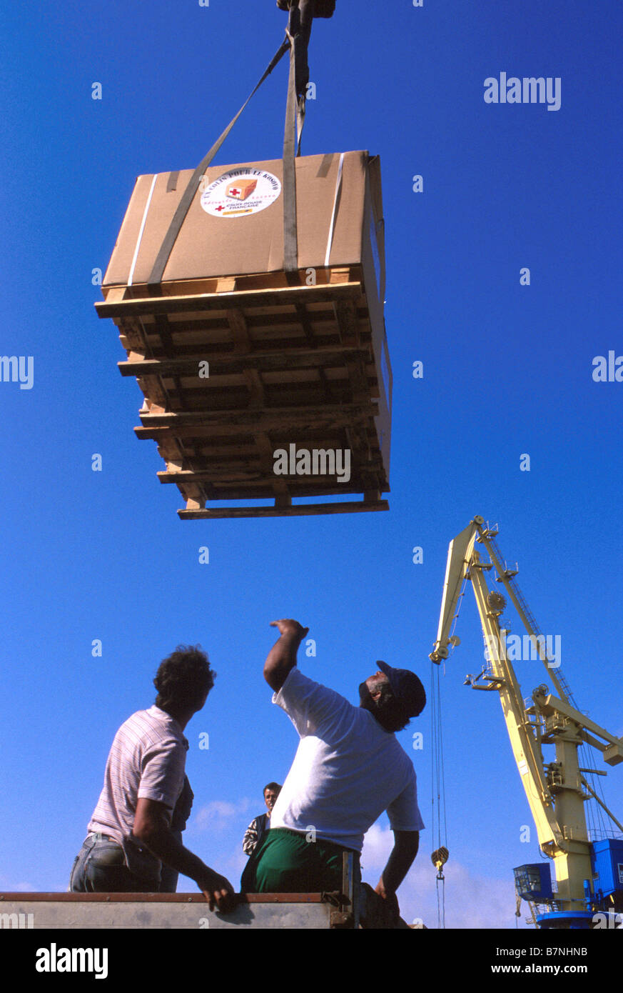 Longshoremen Unloading Red Cross Aid In Durres Albania From Ship During Kosovo Conflict Stock