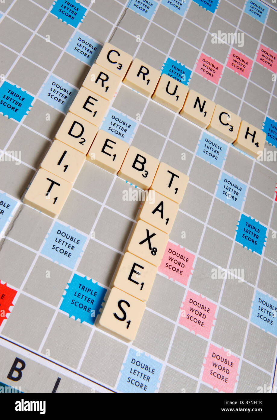 Scrabble board game financial hi-res stock photography and images - Alamy