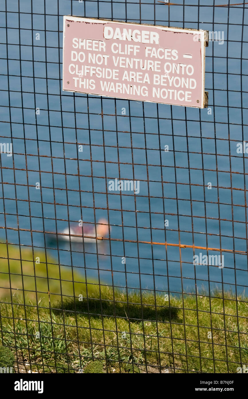Danger Sign warning about a sheer cliff face Stock Photo - Alamy