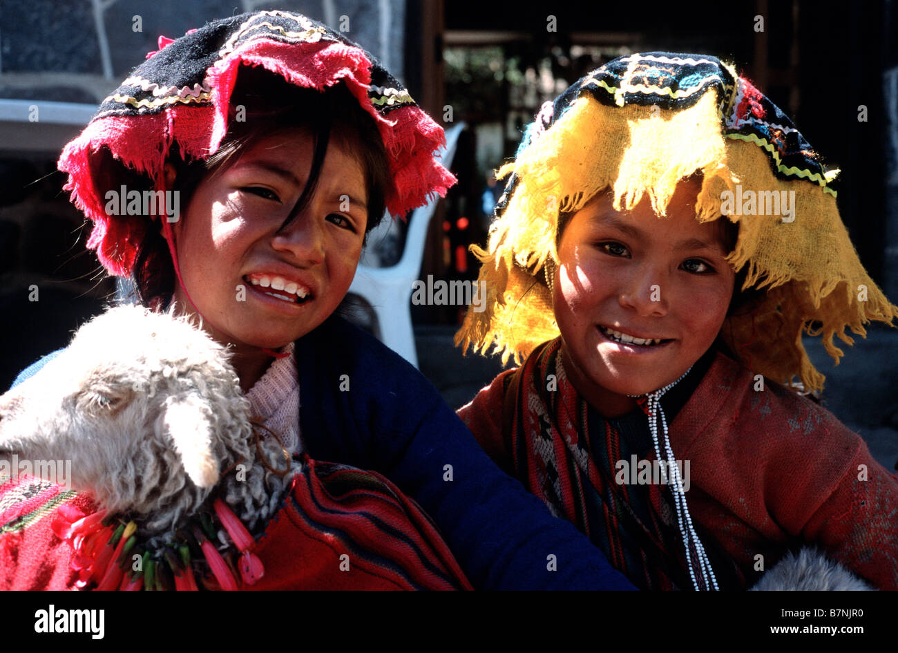 Two quechua children in a small town near Cuzco Peru Stock Photo - Alamy