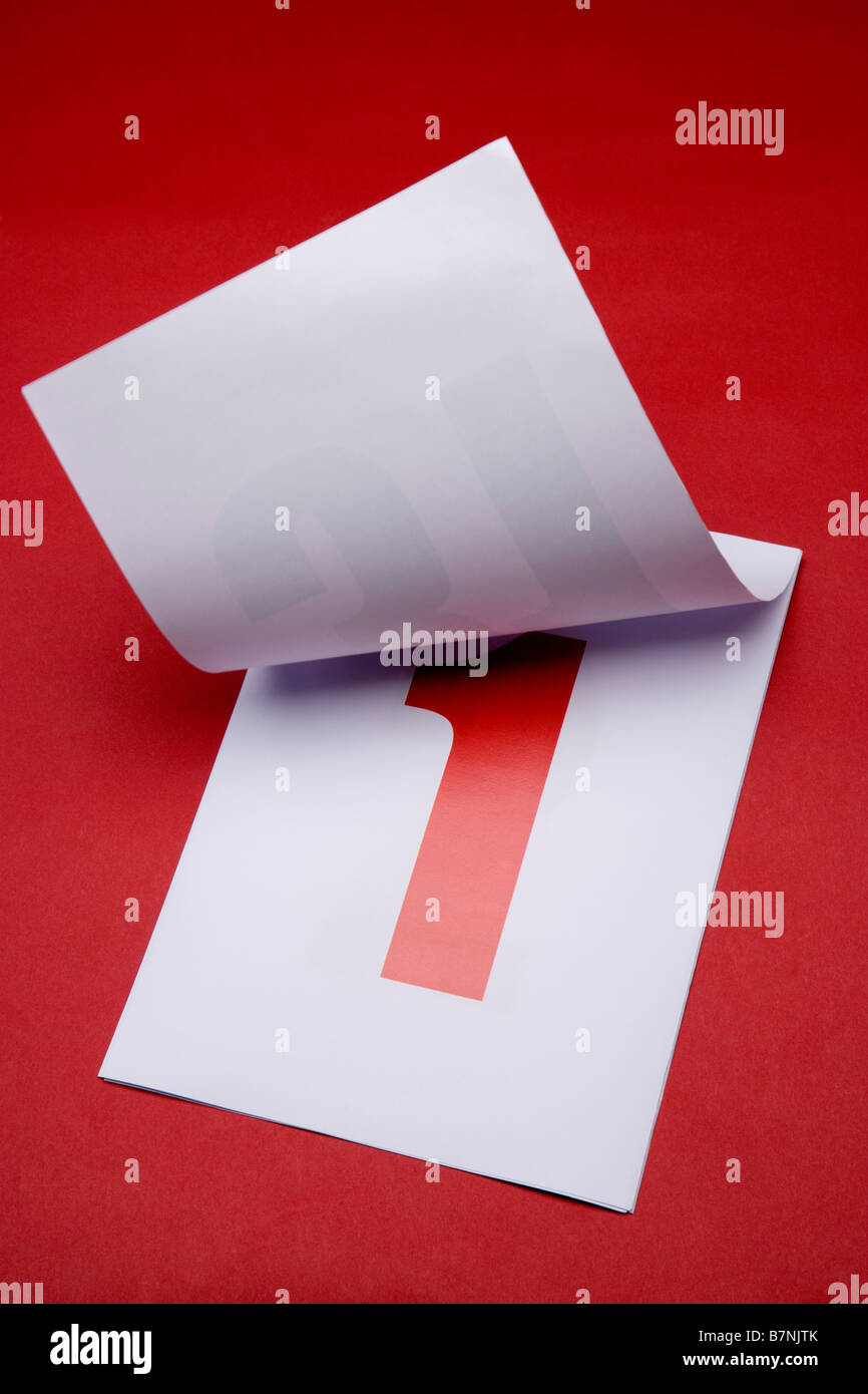 Calendar papers with red background Stock Photo - Alamy