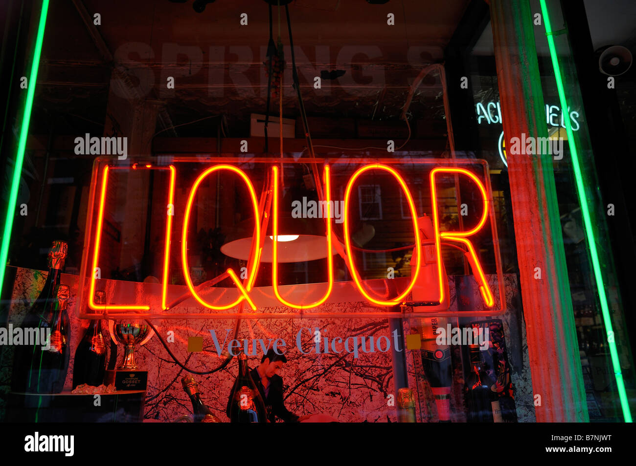 Neon sign in the window of a liquor store in New York City Stock Photo ...
