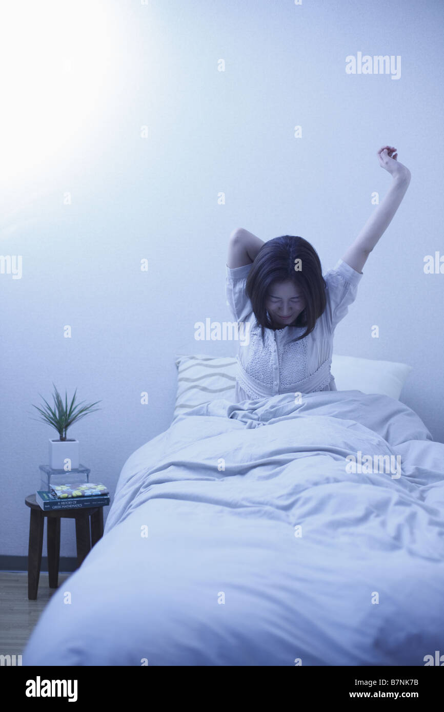 A woman getting up Stock Photo - Alamy