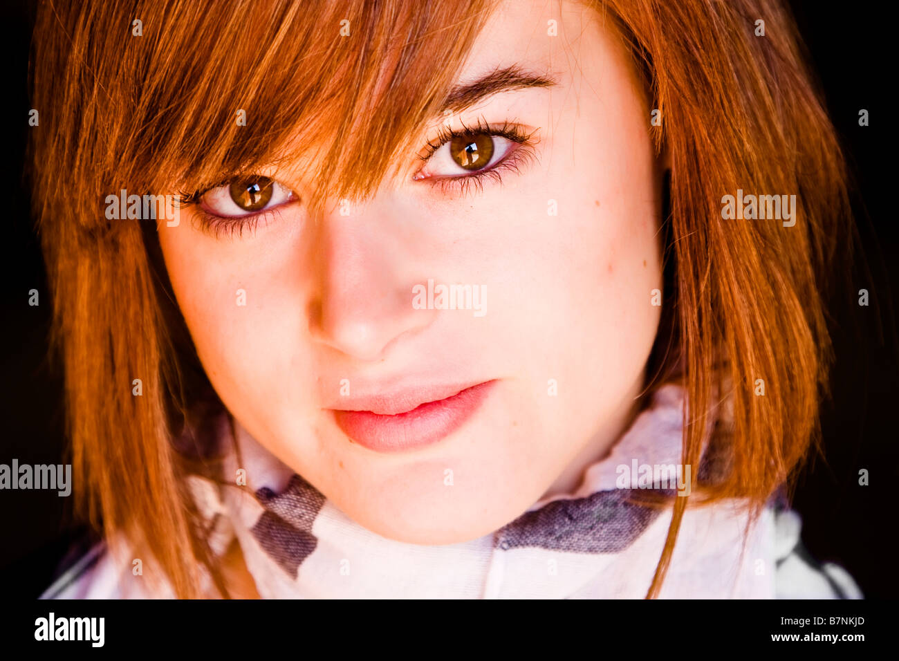 Young woman close portrait staring at camera Stock Photo - Alamy