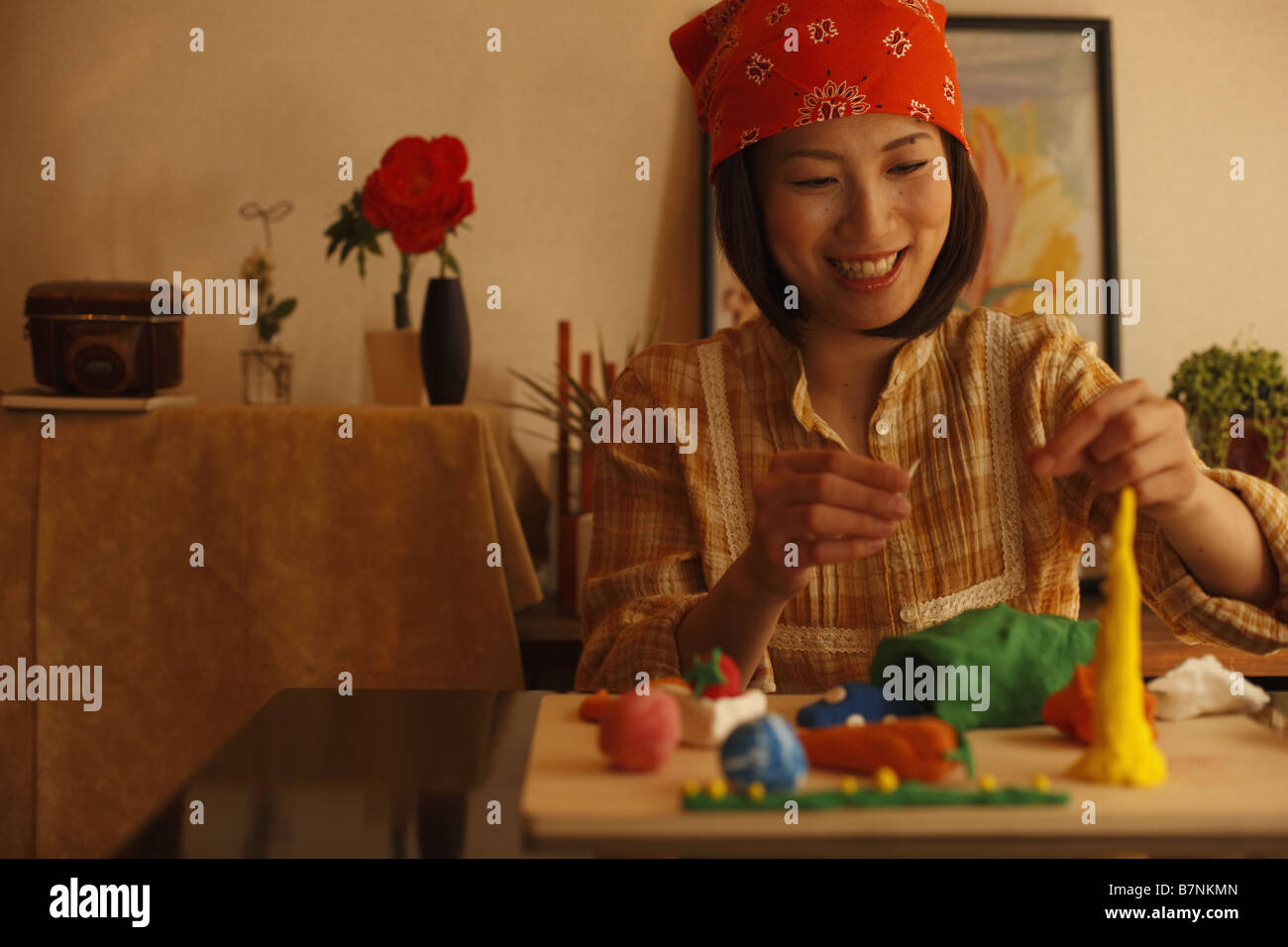 Woman making clay decorations hi-res stock photography and images - Alamy