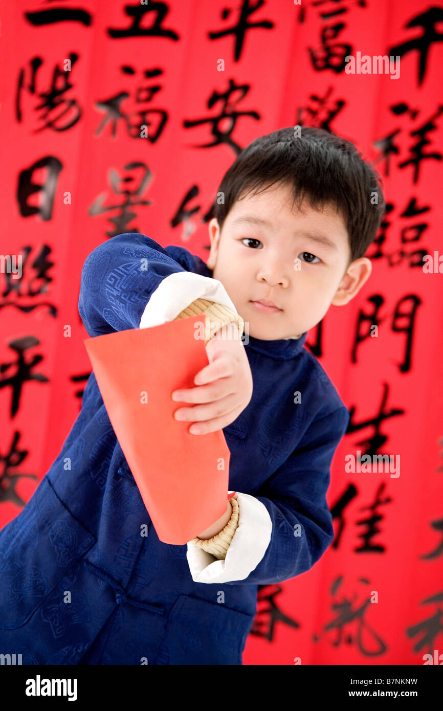 Boy in chinese traditional clothes hi-res stock photography and images ...