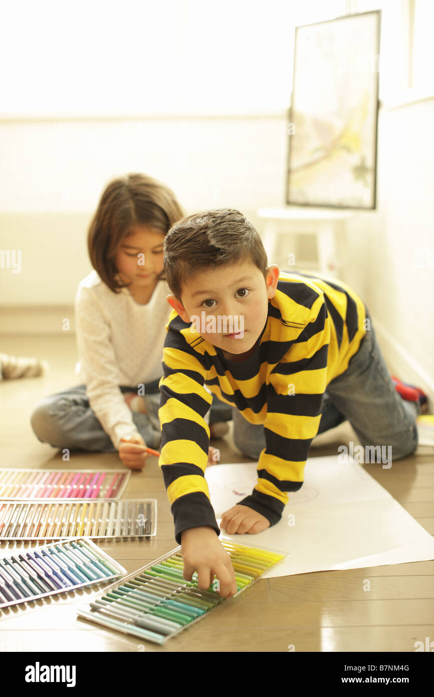 Children writing graffiti Stock Photo - Alamy