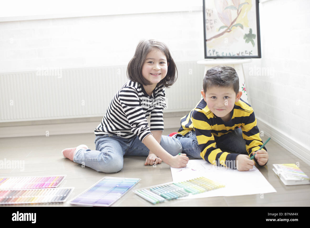 Children writing graffiti Stock Photo - Alamy