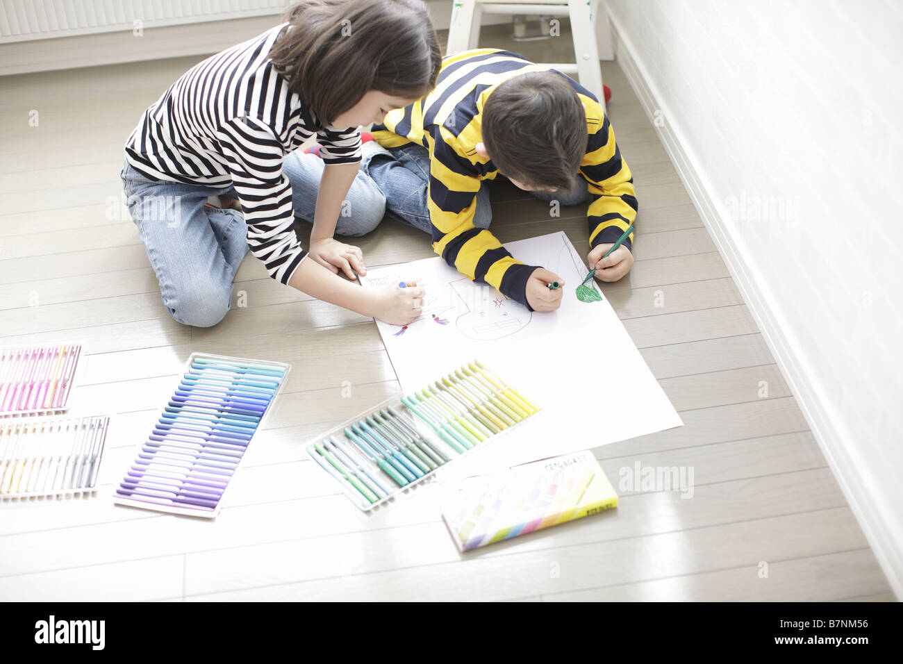Children writing graffiti Stock Photo - Alamy