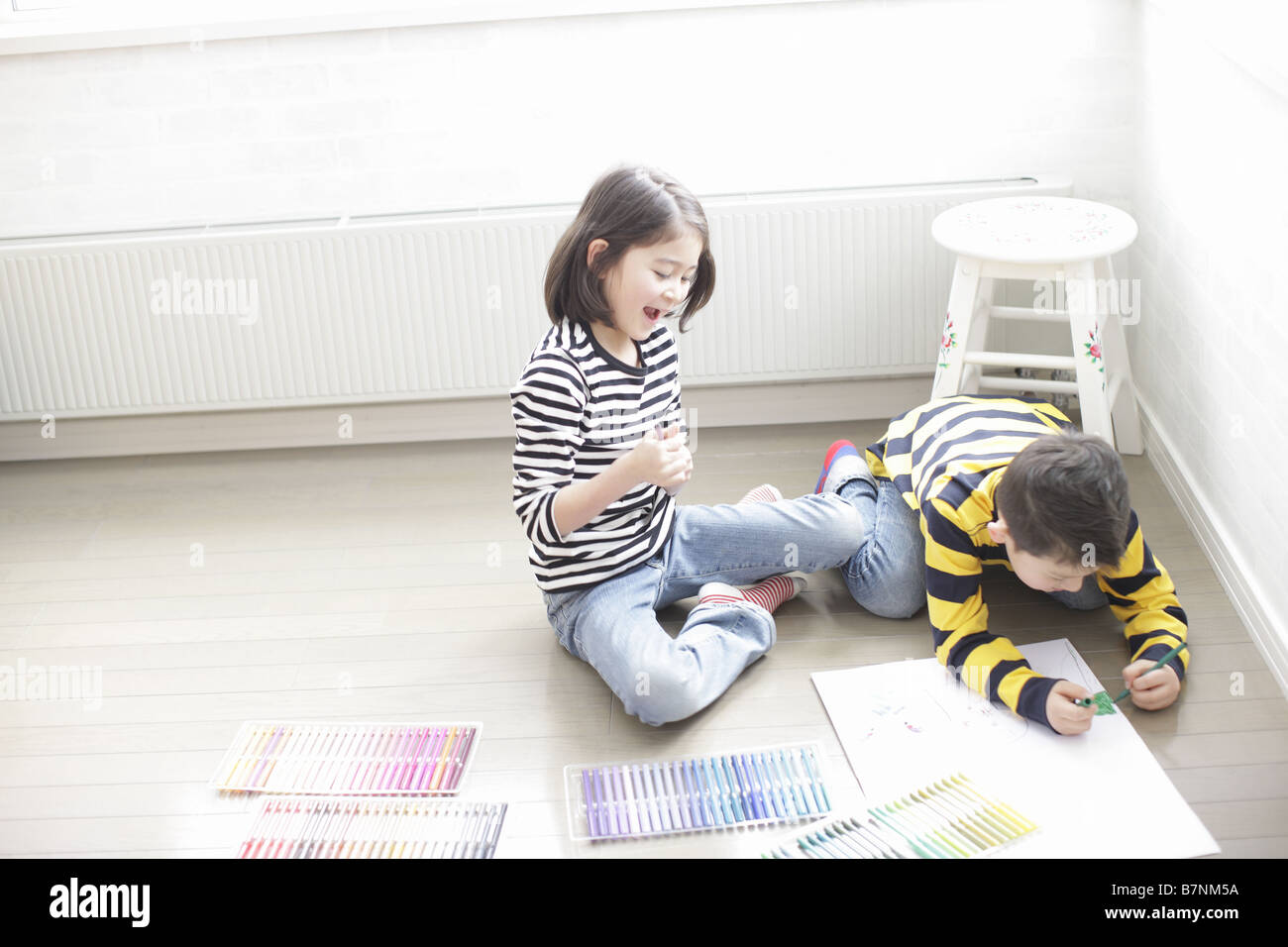 Children writing graffiti Stock Photo - Alamy