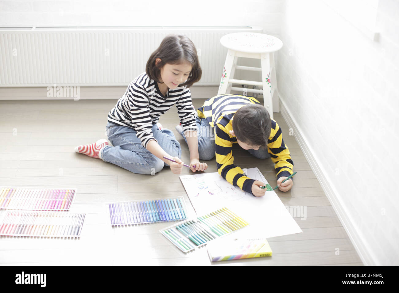 Children writing graffiti Stock Photo - Alamy