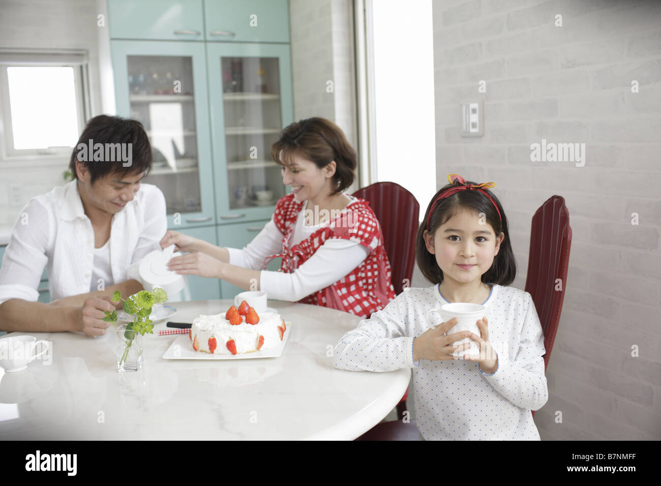 Three girls having tea hi-res stock photography and images - Alamy