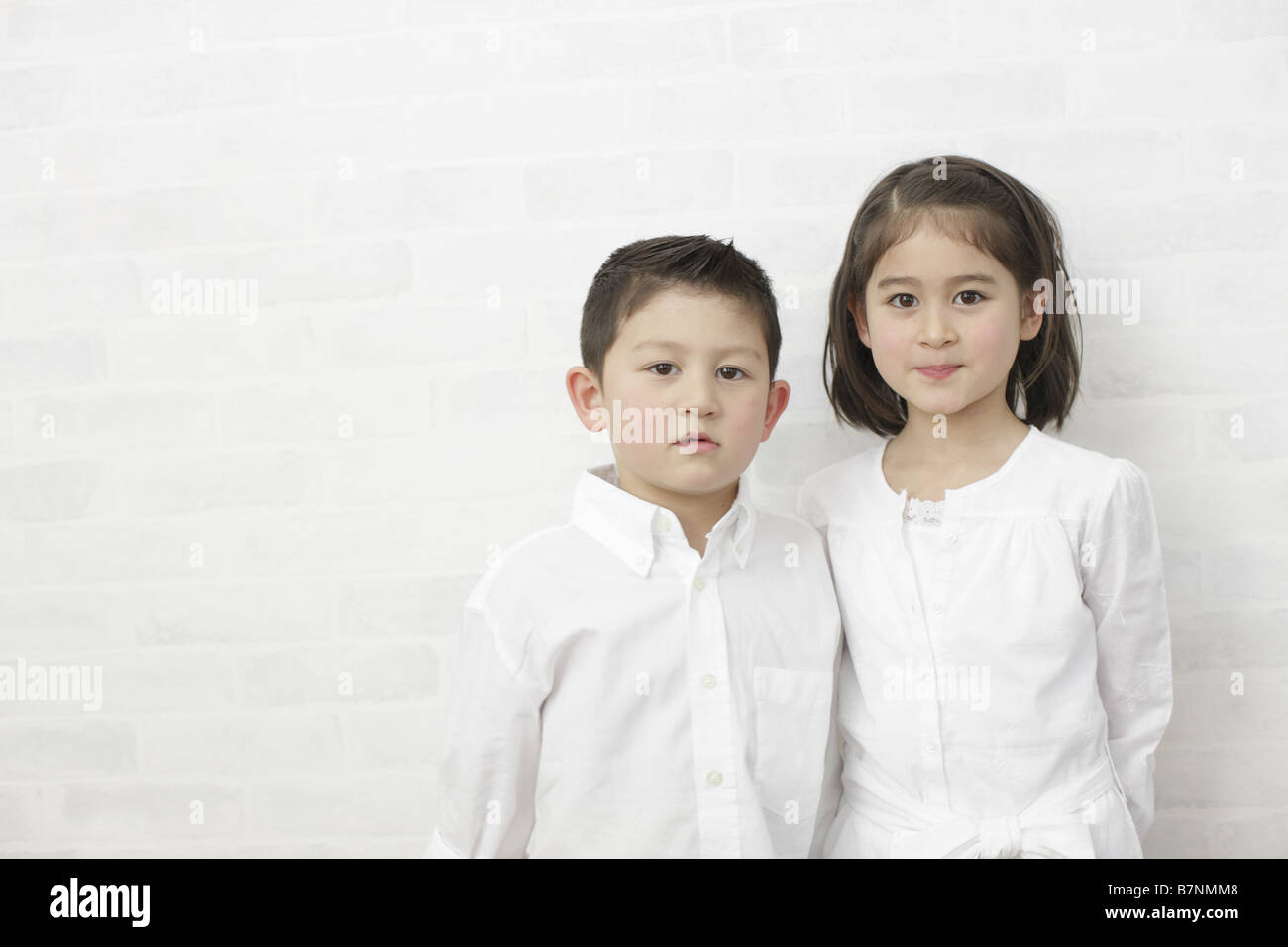 Children cuddling up Stock Photo - Alamy