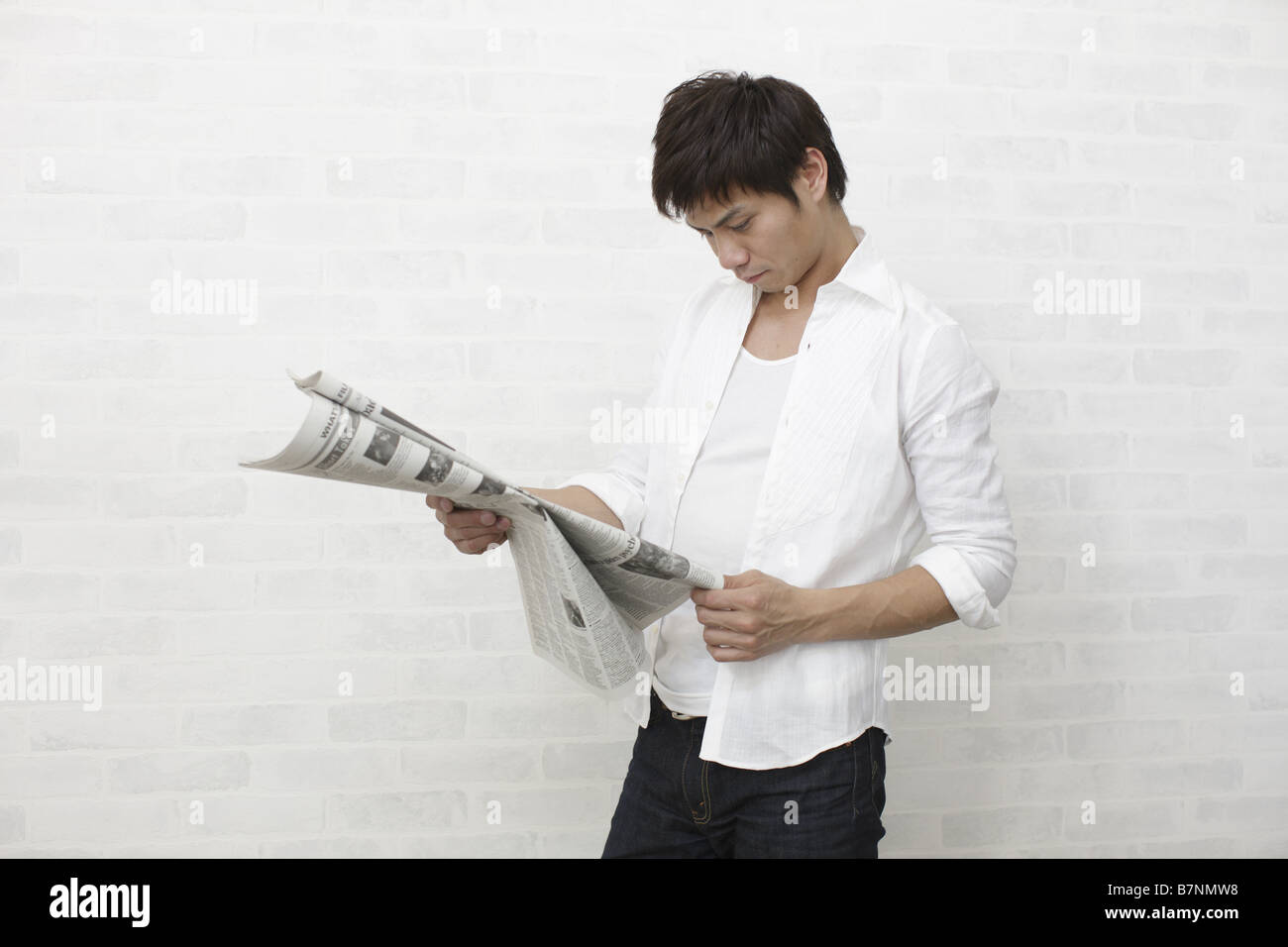 Black man reading research hi-res stock photography and images - Alamy