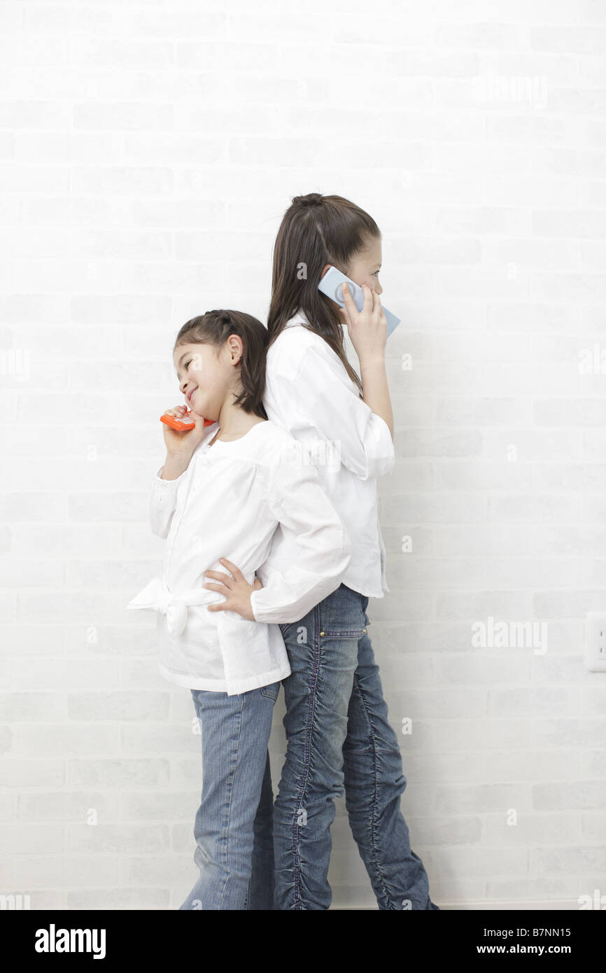 Children using mobile phones Stock Photo - Alamy