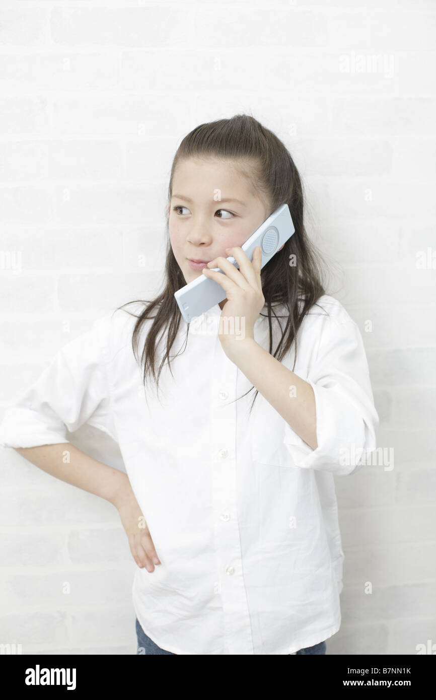 A girl using mobile phone Stock Photo - Alamy