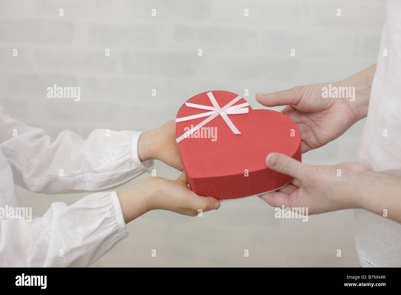 Two girls holding hands hi-res stock photography and images - Alamy