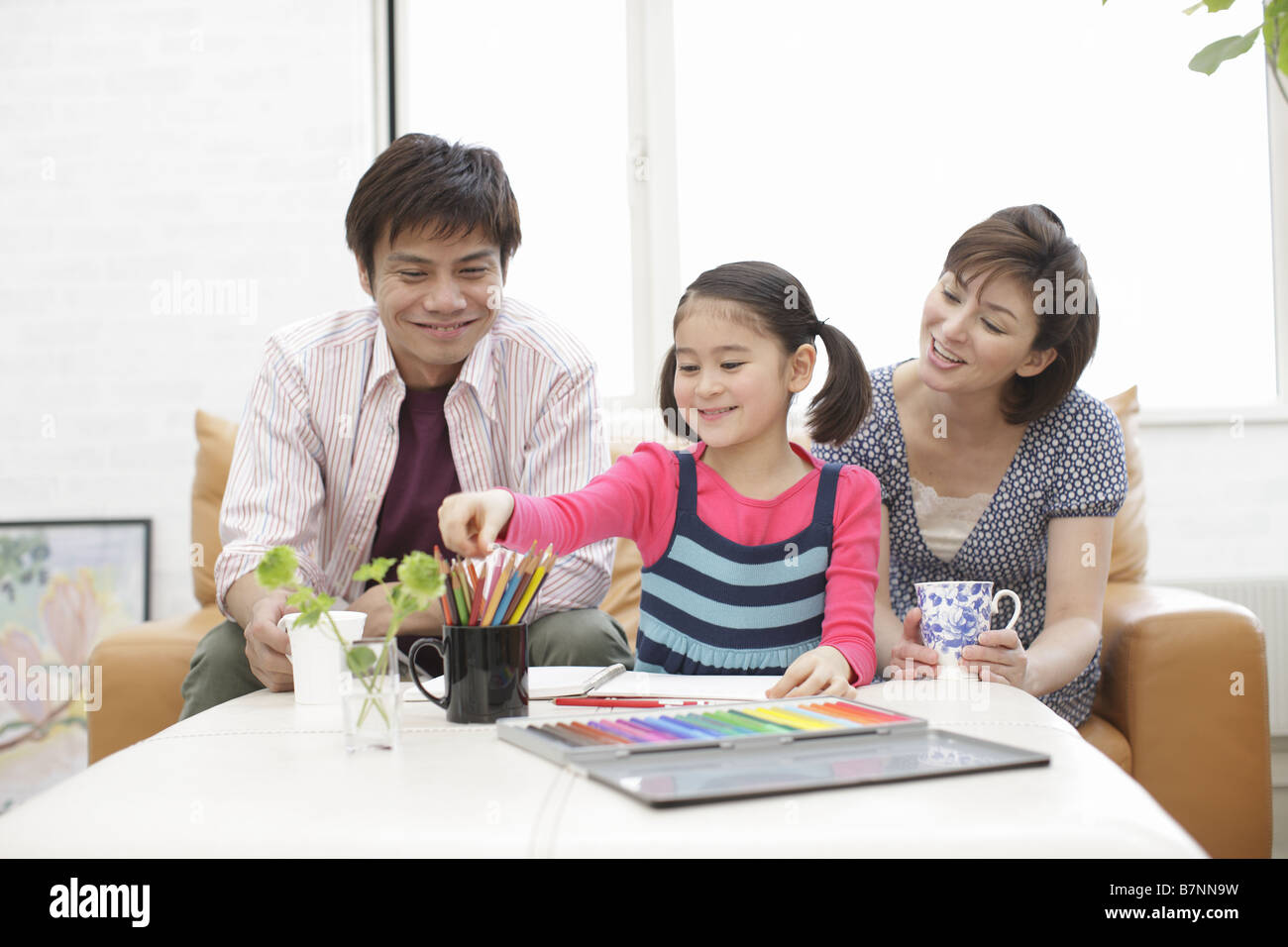 Family writing graffiti Stock Photo - Alamy