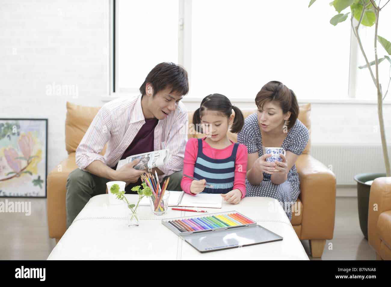 Family writing graffiti Stock Photo - Alamy