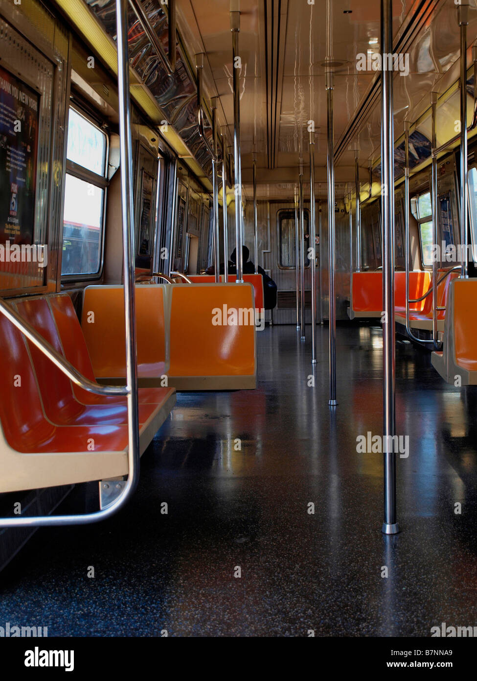 Empty seats in a largely empty subway car on the W train line servicing ...