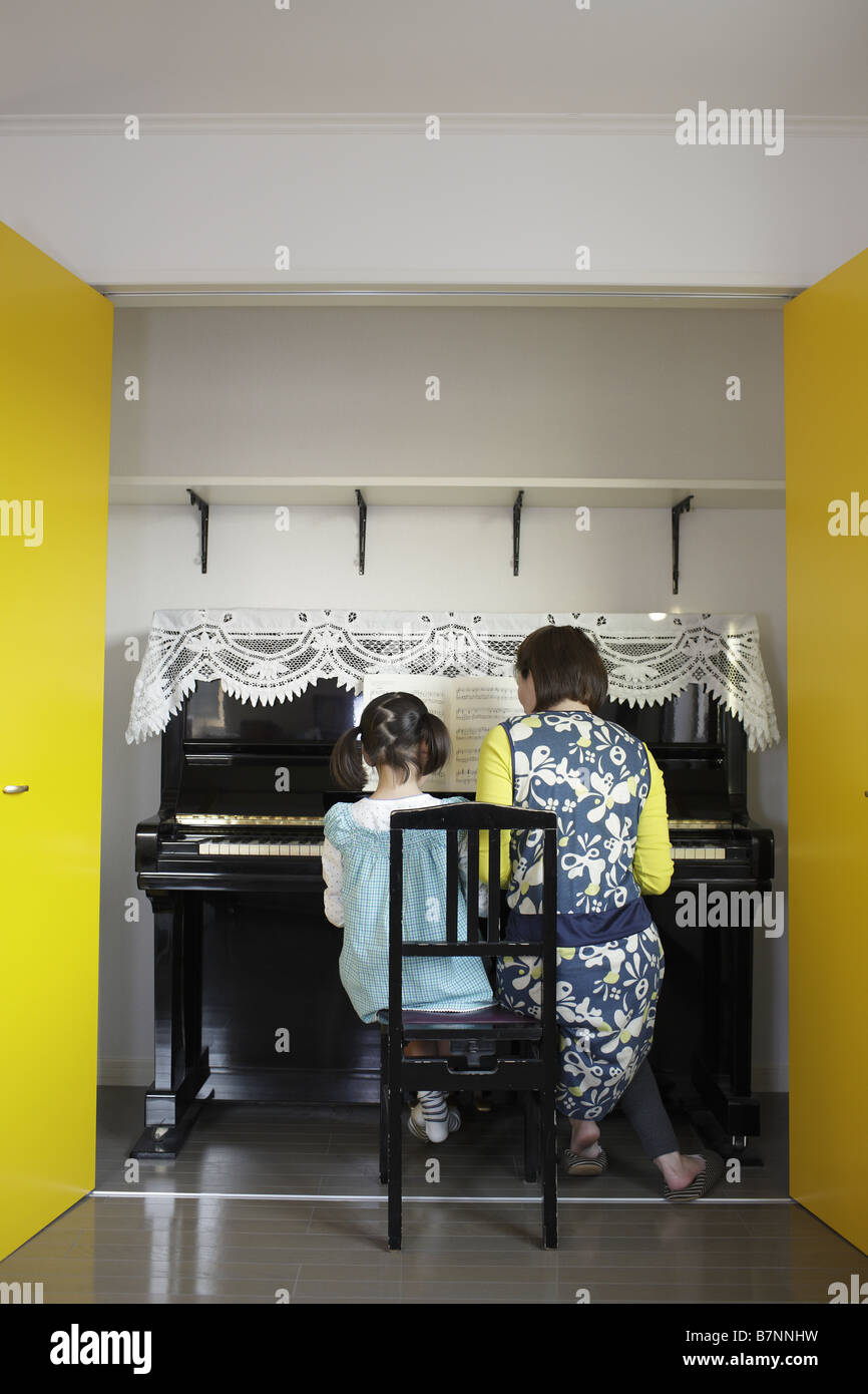 Child piano lesson hi-res stock photography and images - Alamy