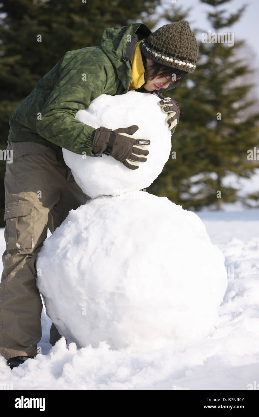 Japanese man standing in snow hi-res stock photography and images - Alamy