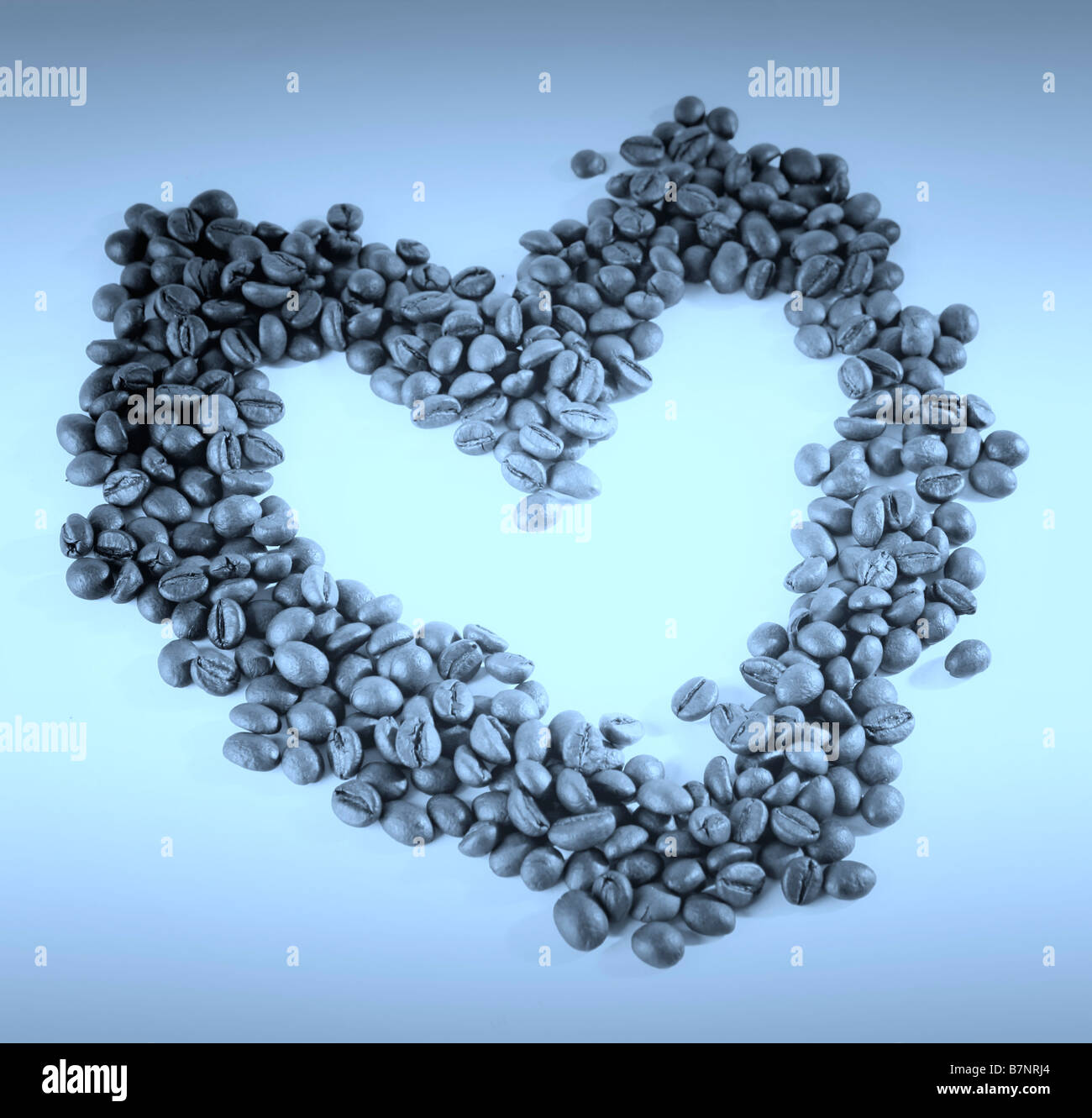Heart made from coffee beans Stock Photo - Alamy