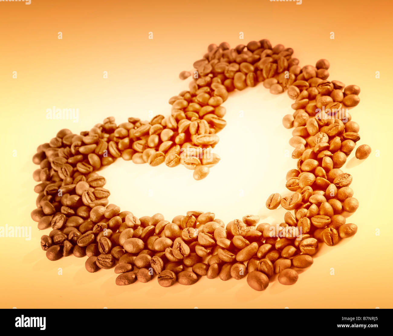 Heart made from coffee beans Stock Photo - Alamy
