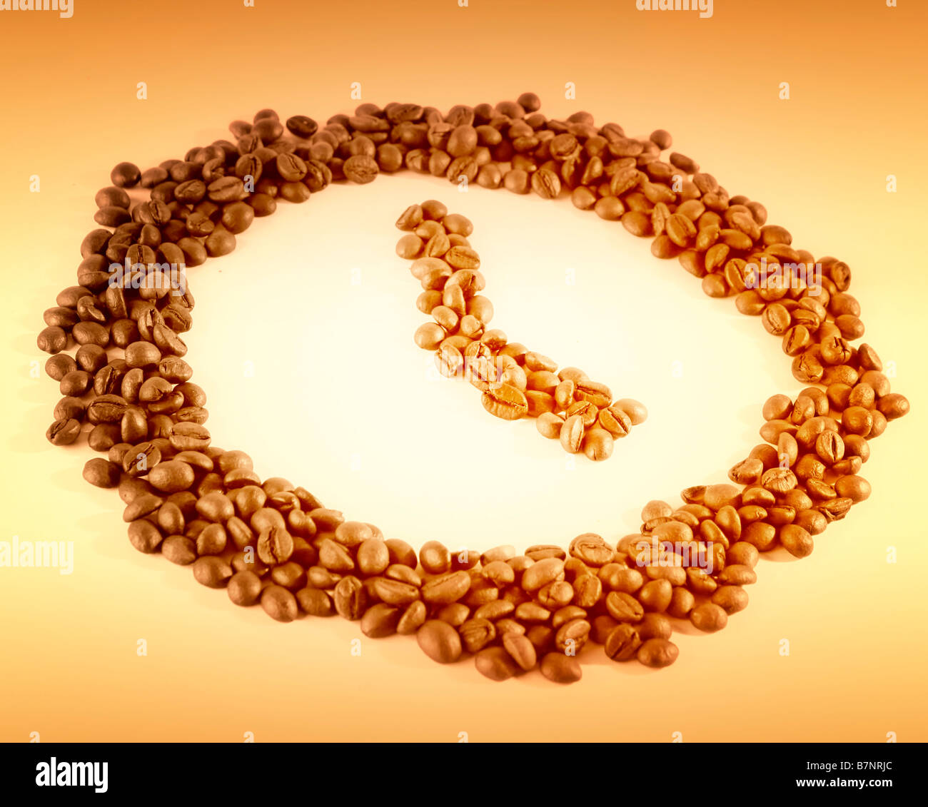 Clock made from coffee beans Stock Photo - Alamy
