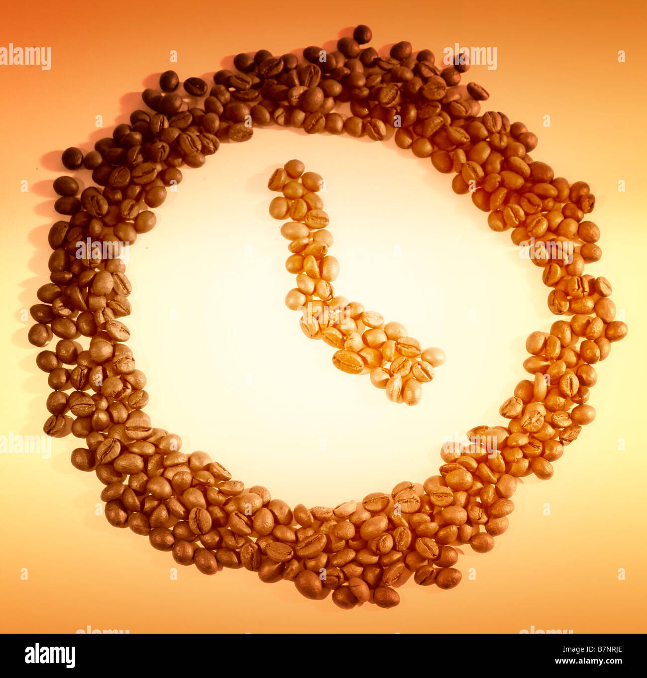 Clock made from coffee beans Stock Photo - Alamy