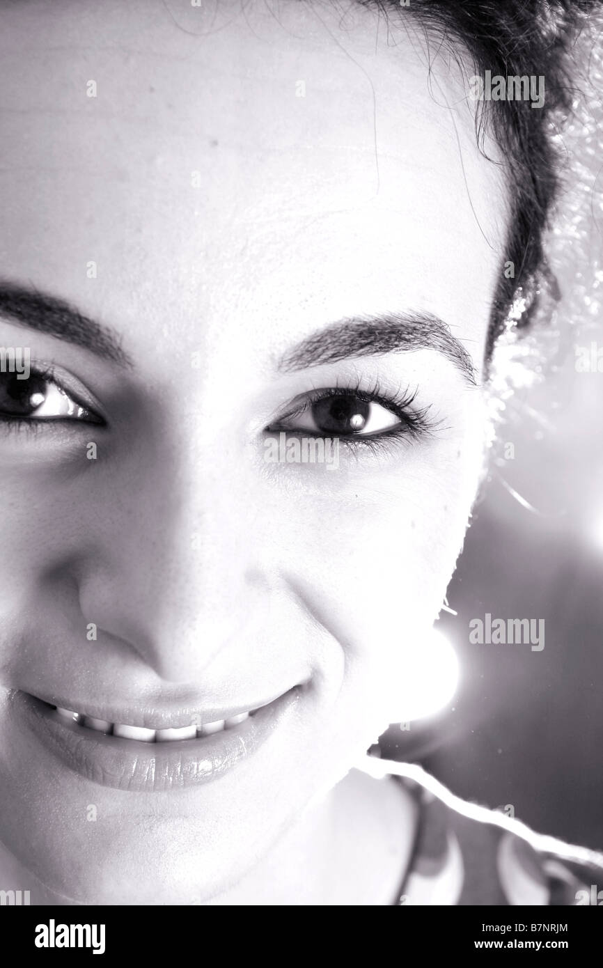Beautiful woman face with light effects Stock Photo - Alamy