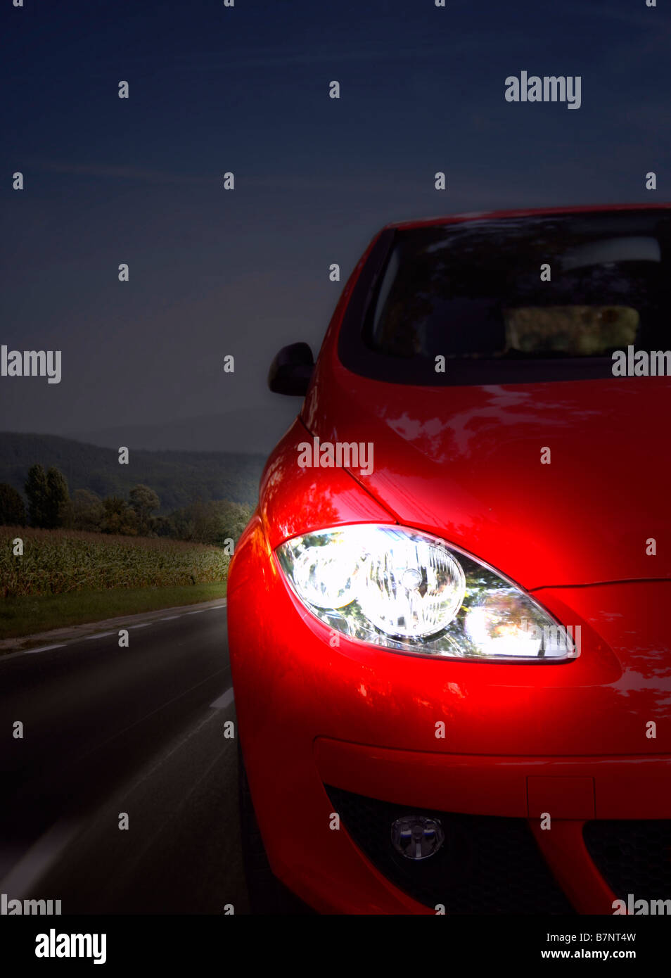 Image of a car viewed from the front on the highway Stock Photo - Alamy