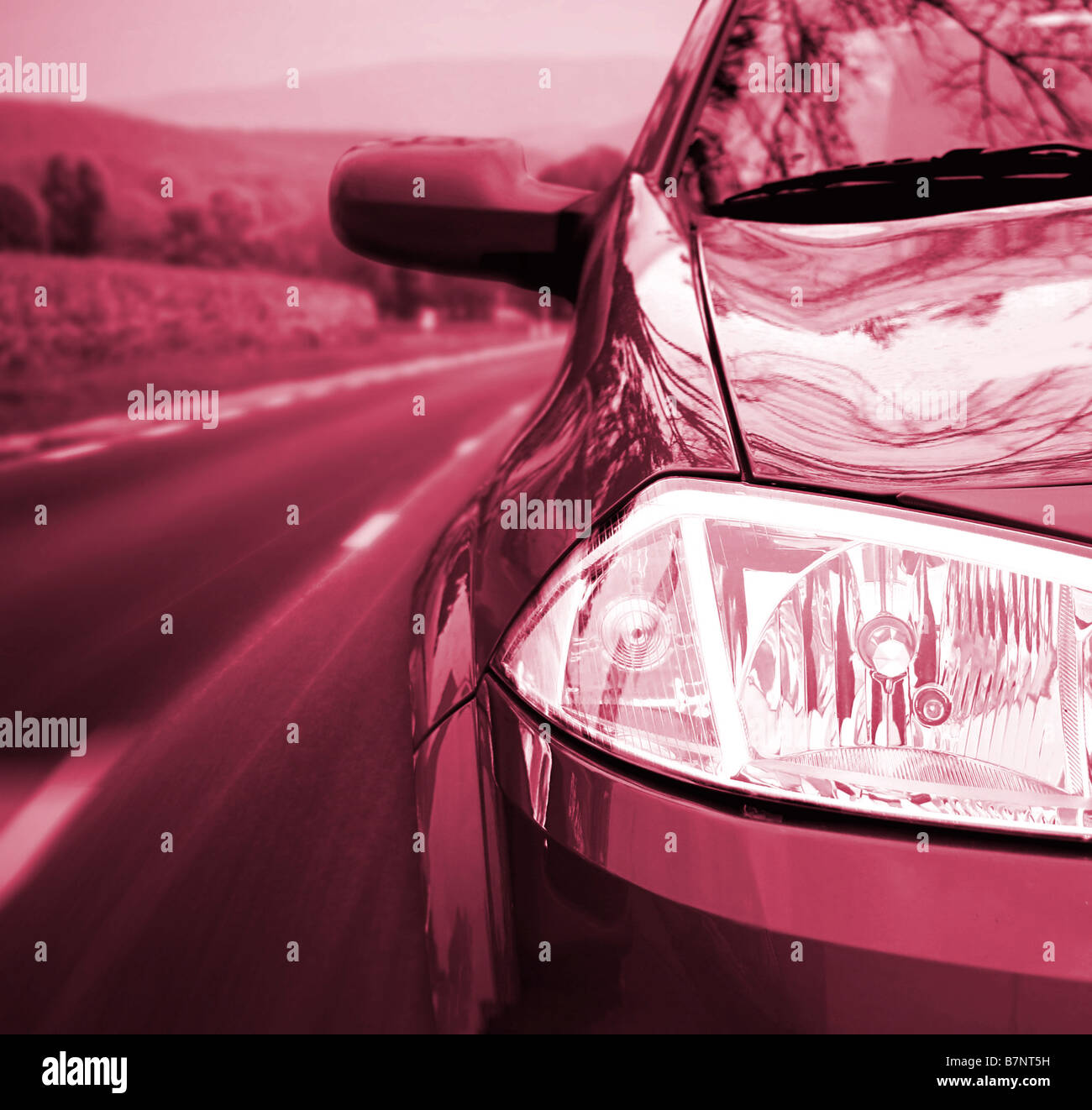 Car on the road view from the front Stock Photo - Alamy