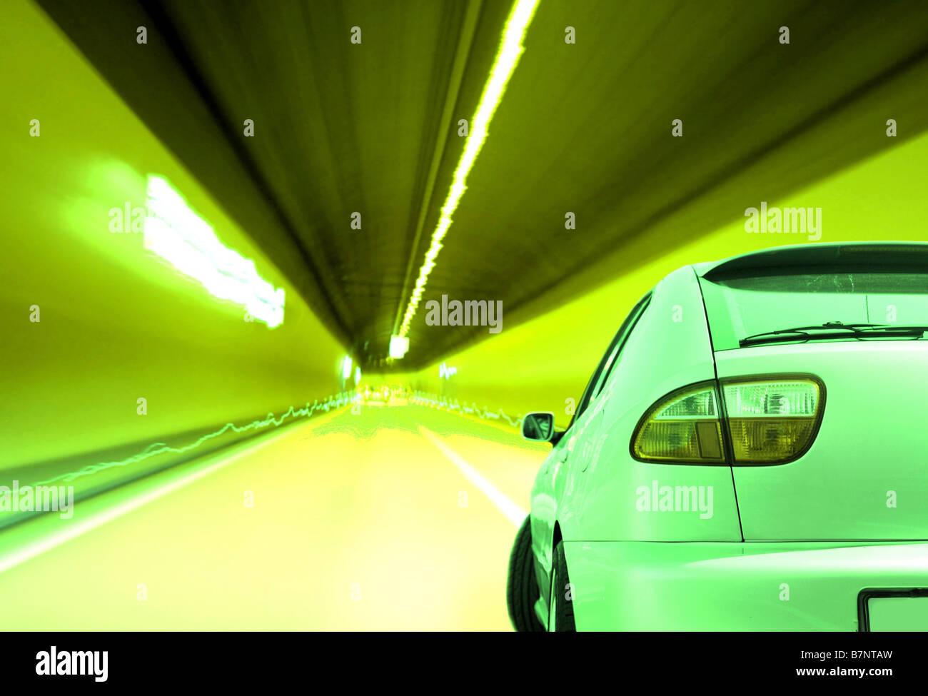 Car on the road view from the back Stock Photo - Alamy
