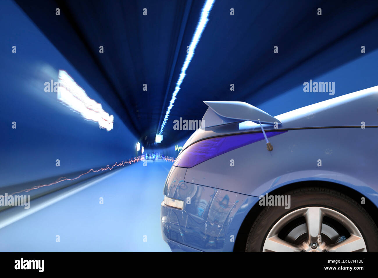 Car on the road view from the lateral Stock Photo - Alamy