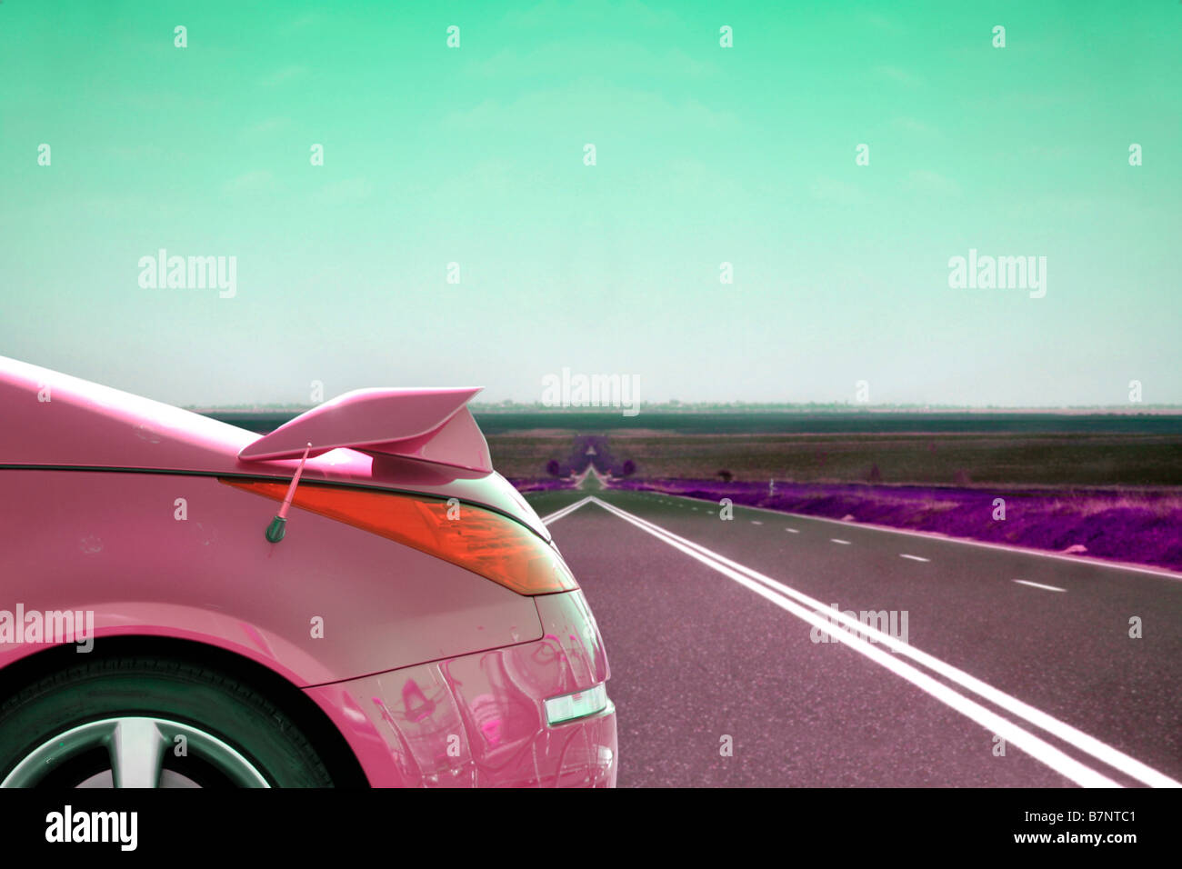 Car on the road view from the lateral Stock Photo - Alamy