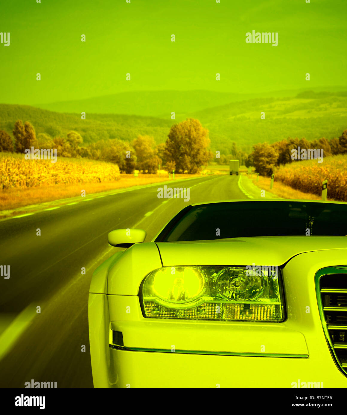 Luxury car on the highway Stock Photo - Alamy