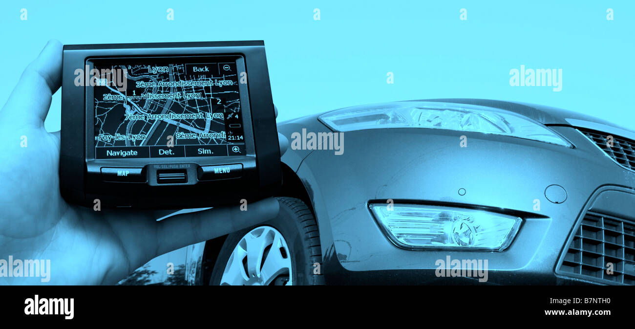 GPS Vehicle navigation system in a man hand Stock Photo - Alamy