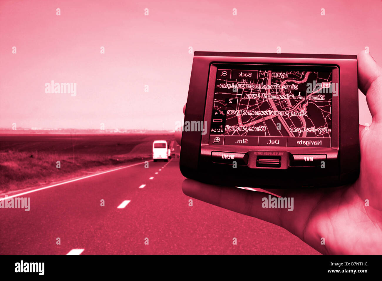 GPS Vehicle navigation system in a man hand Stock Photo - Alamy