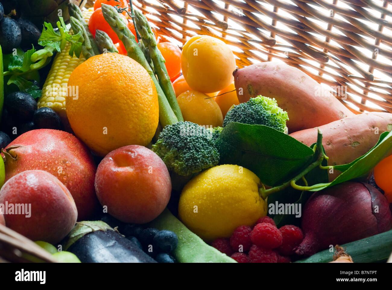 wicker hamper of mixed fruit and vegetables Stock Photo - Alamy